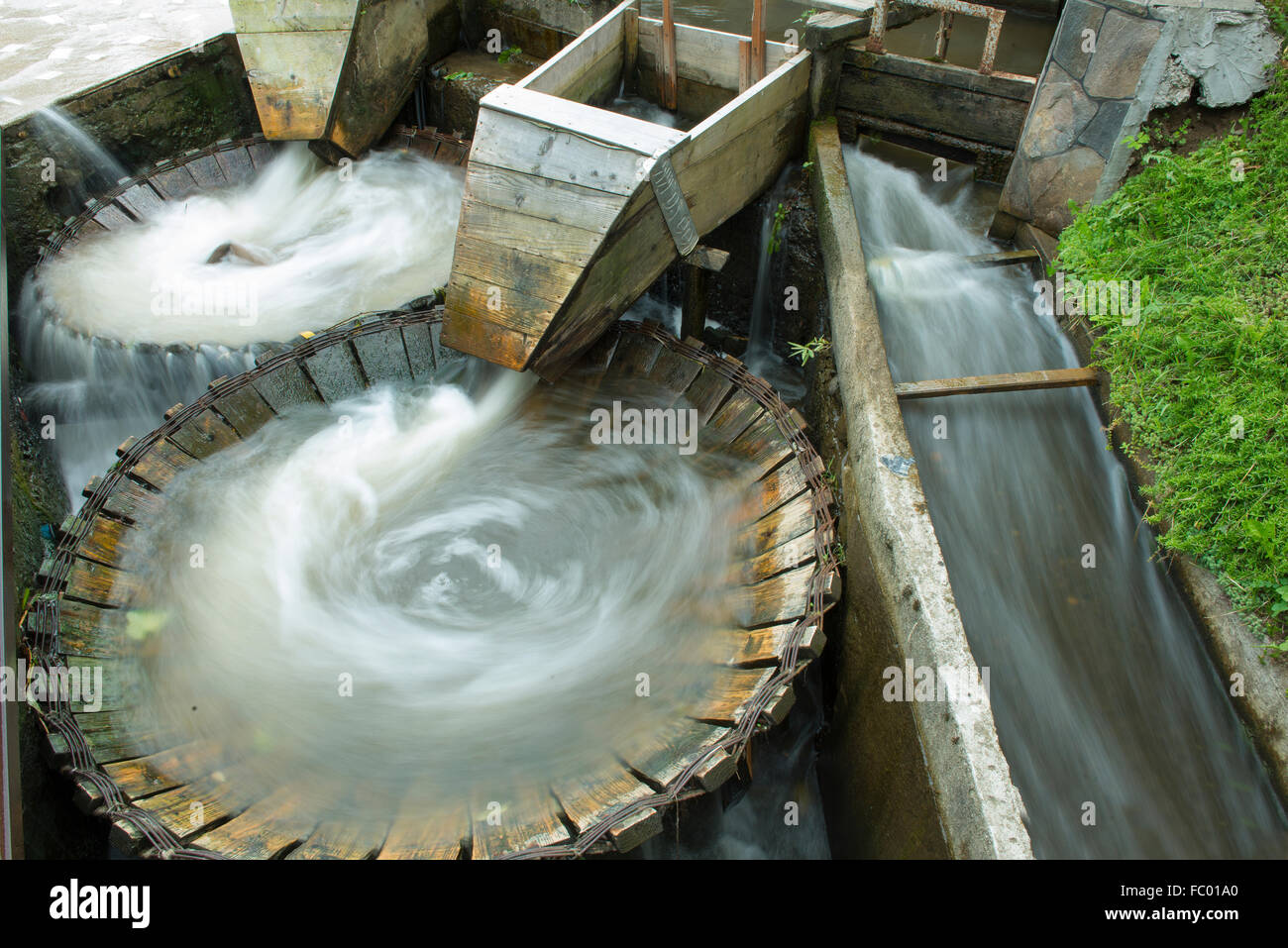 large wooden washing machines which draw water from the river for ...