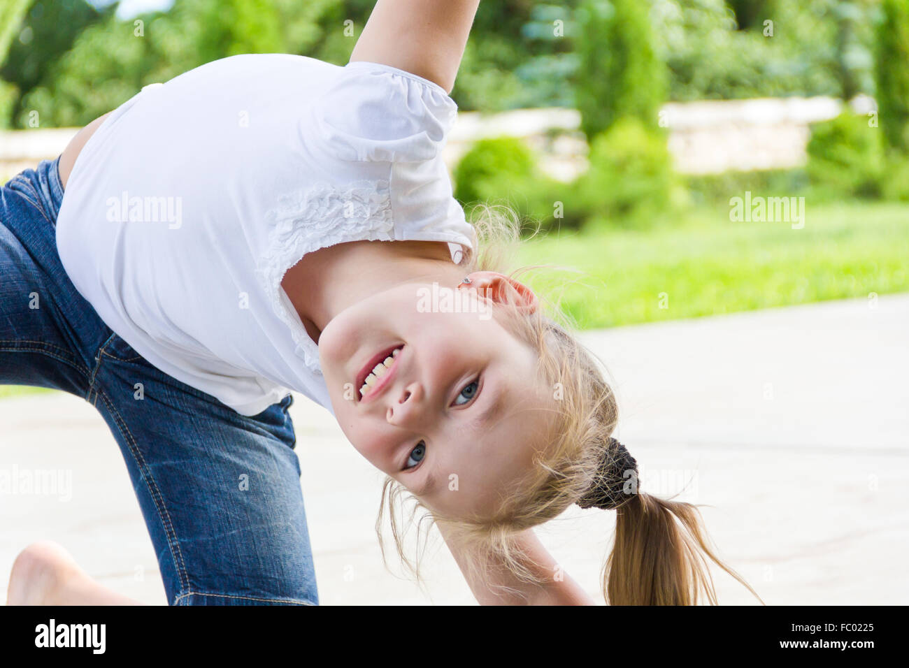 Cute jumping girl Stock Photo - Alamy