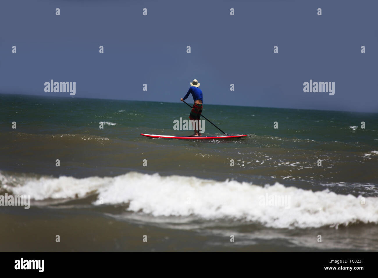 lonely oarsman in a ocean Stock Photo - Alamy