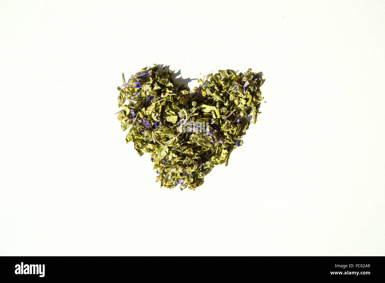 Love for mallow herbal tea isolated closeup Stock Photo - Alamy