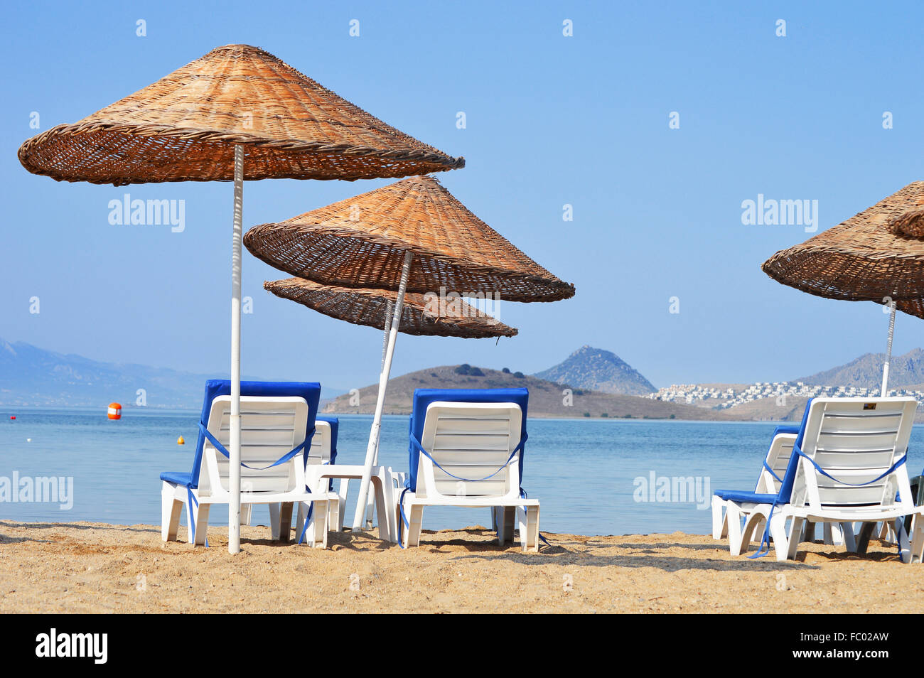 Mediterranean beach during hot summer day Stock Photo - Alamy