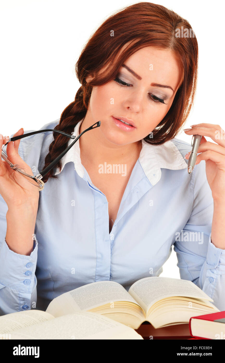 Young woman reading a book. Female student learning Stock Photo - Alamy