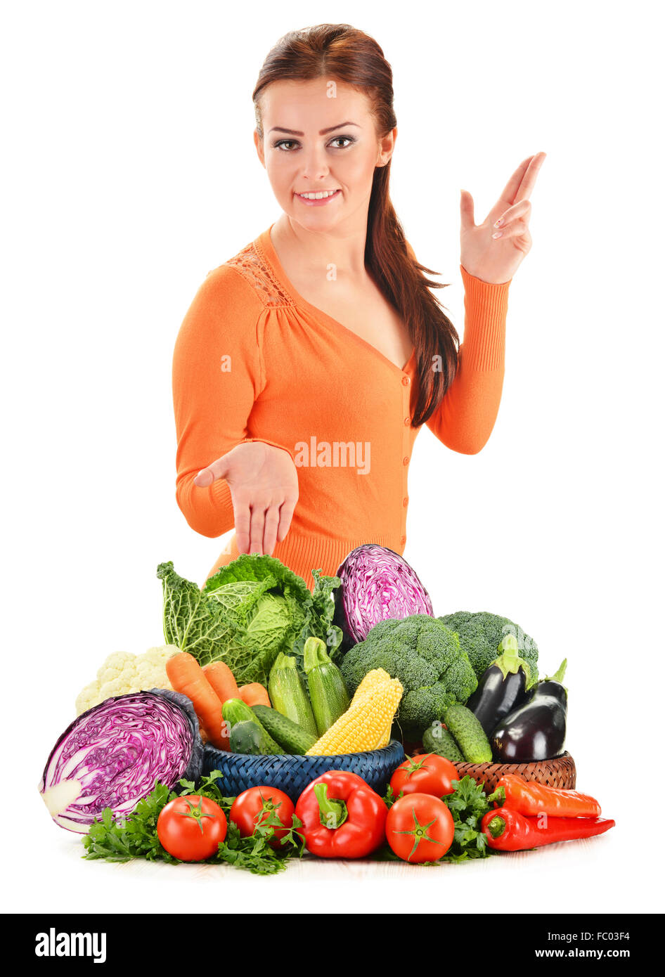 Young woman with assorted vegetables isolated on white background Stock ...