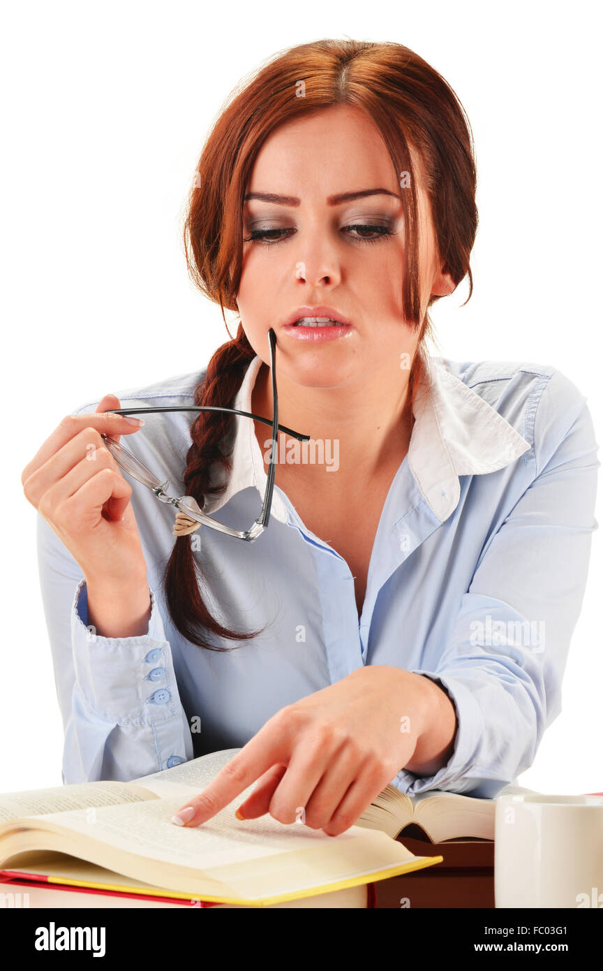 Young woman reading a book. Female student learning Stock Photo - Alamy
