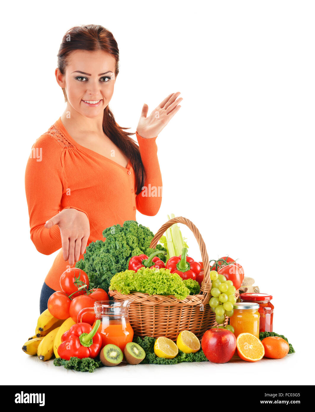 Young woman with assorted vegetables isolated on white background Stock ...