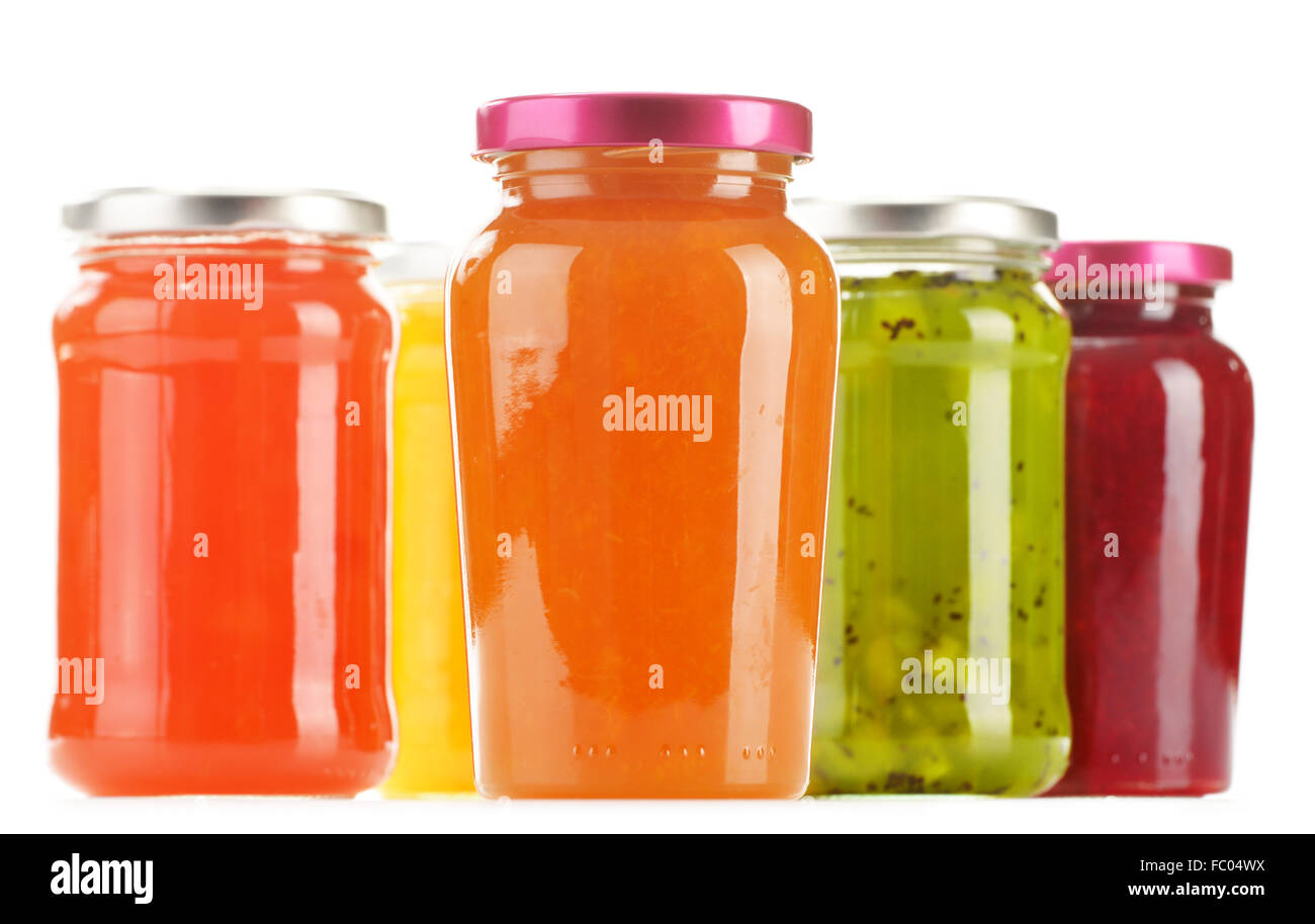Jars of fruity jams isolated on white background. Preserved fruits ...