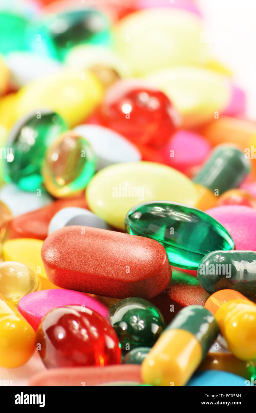 Composition with dietary supplement capsules and drug pills Stock Photo ...