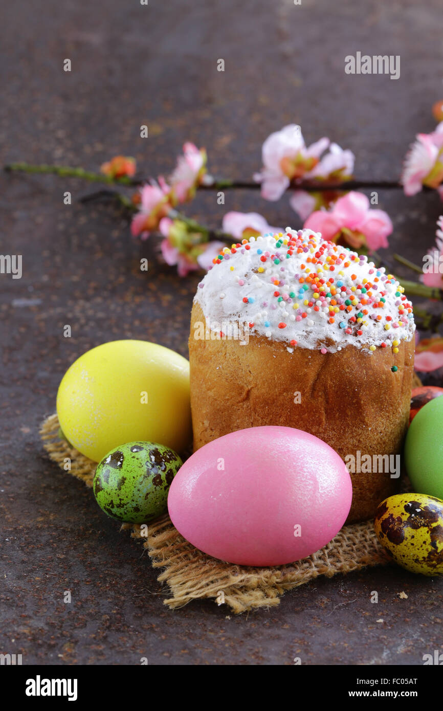 Easter symbol painted colorful eggs and panettone Stock Photo - Alamy