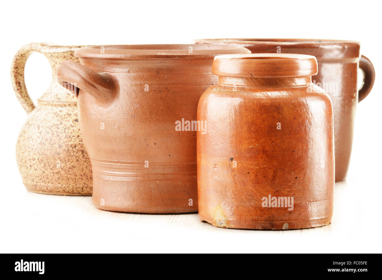 Old pottery. Kitchen dishes isolated on white background Stock Photo ...