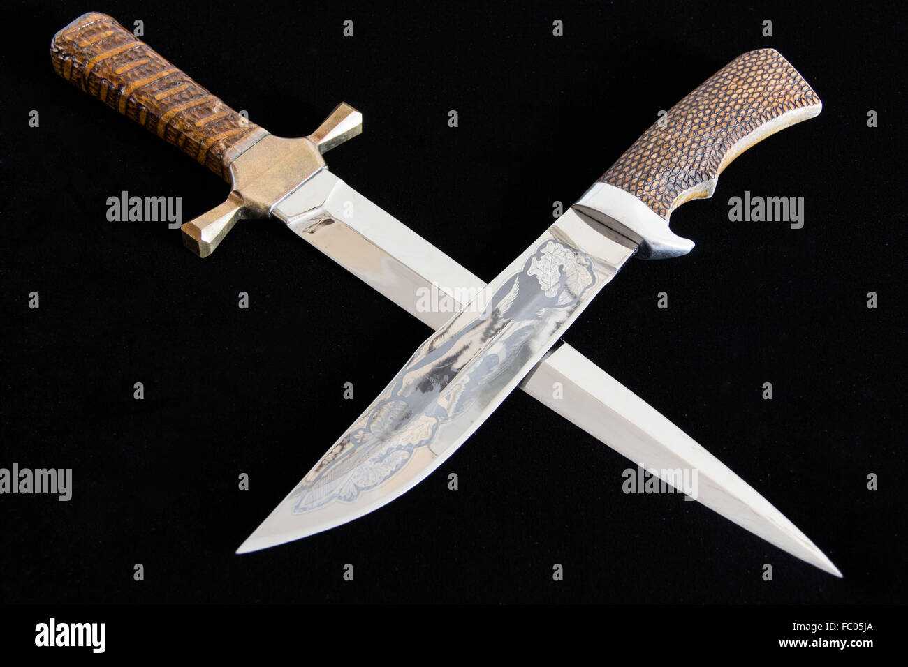 Cold weapon on black background Stock Photo - Alamy