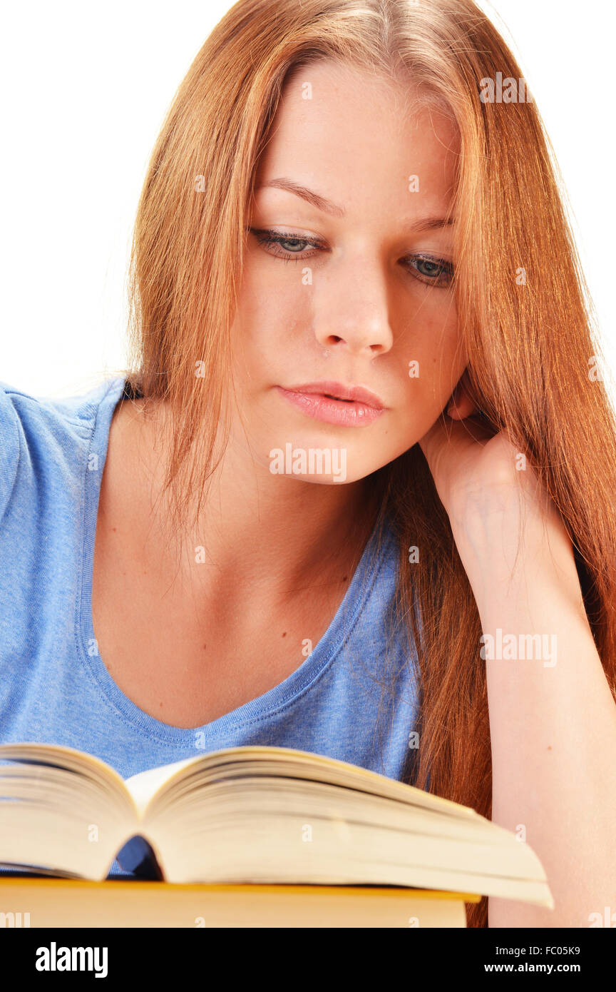 Young woman reading a book. Female student learning Stock Photo - Alamy