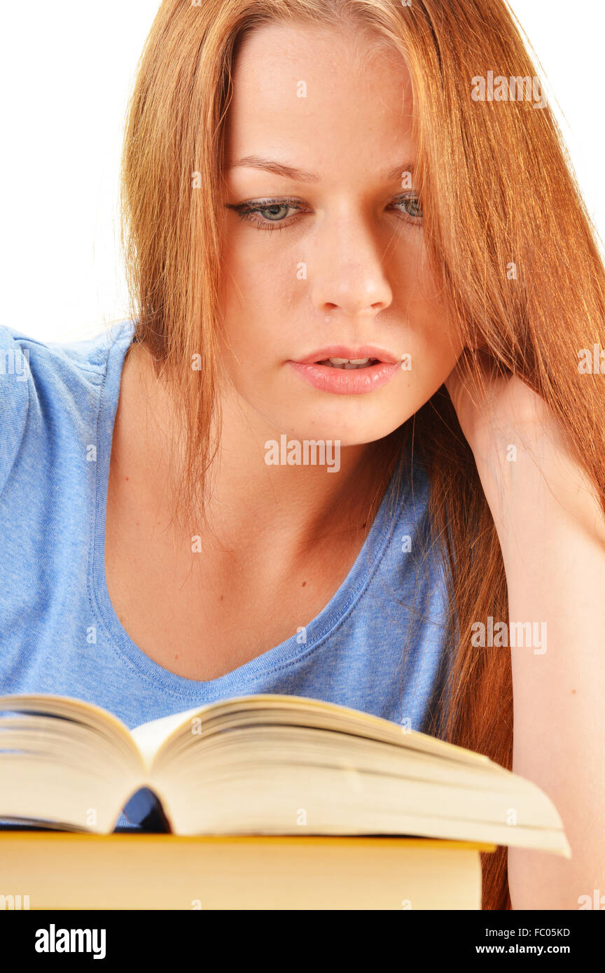 Young woman reading a book. Female student learning Stock Photo - Alamy