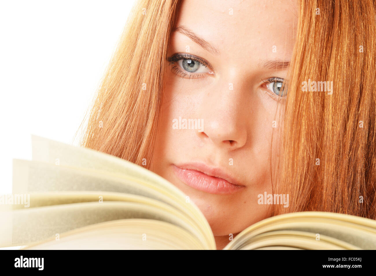 Young woman reading a book. Female student learning Stock Photo - Alamy