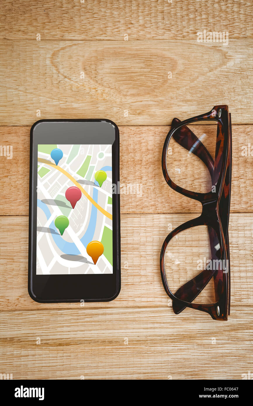 Composite image of multi colored navigation pointers on map Stock Photo ...