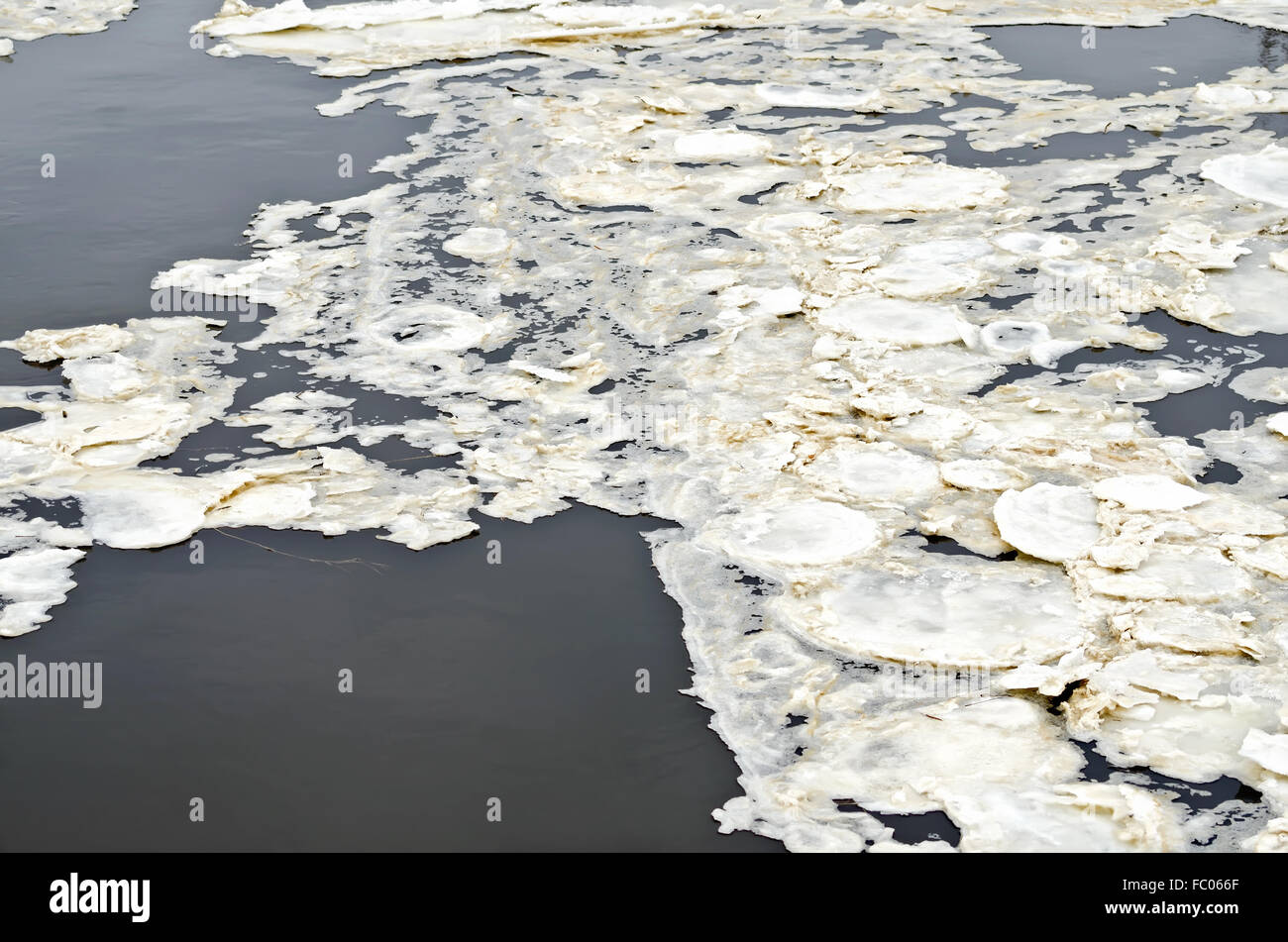 Ice dirty in water Stock Photo - Alamy
