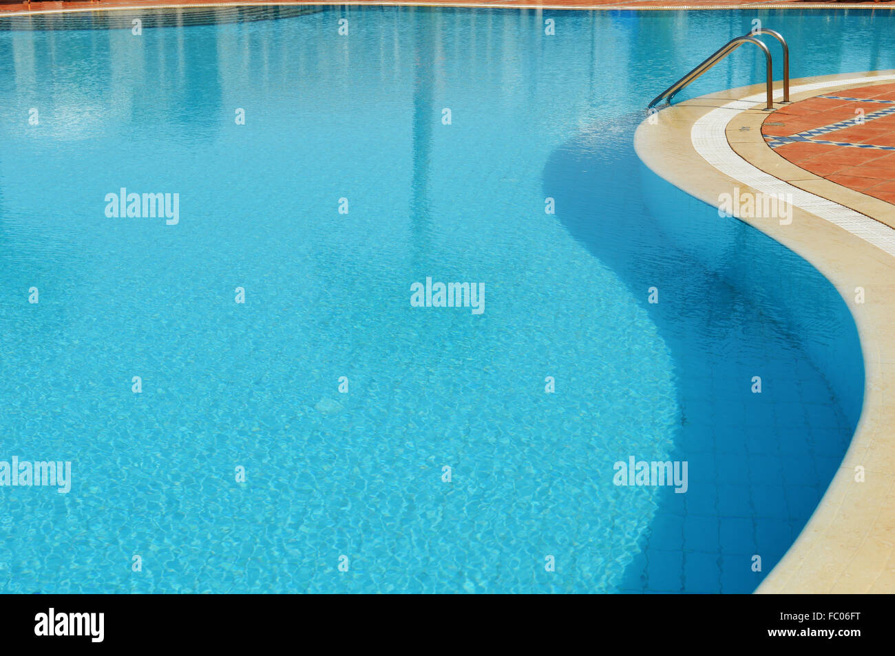 Swimming pool in touristic resort during summer time Stock Photo - Alamy