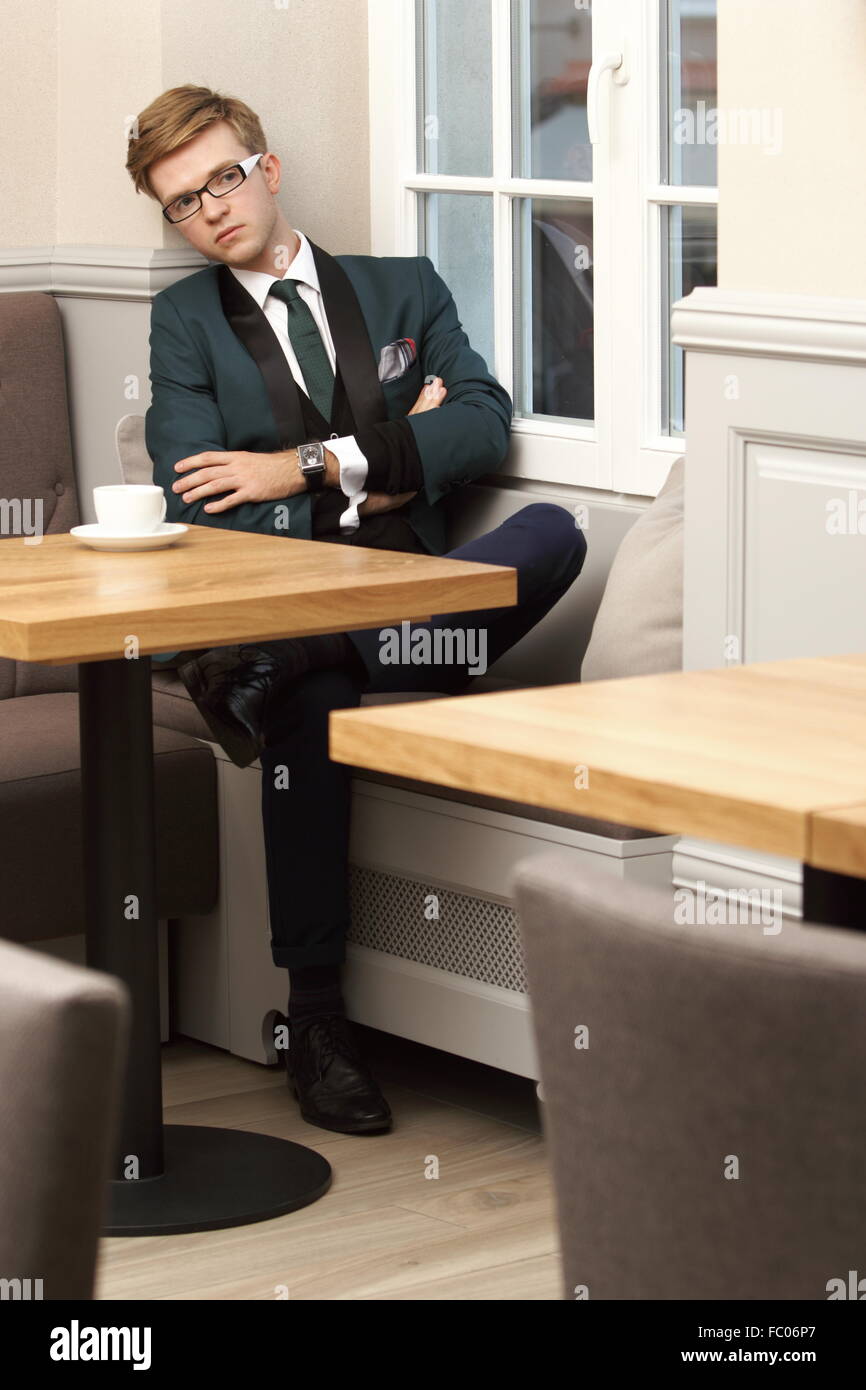 Young handsome stylish man in cafe with coffee Stock Photo - Alamy