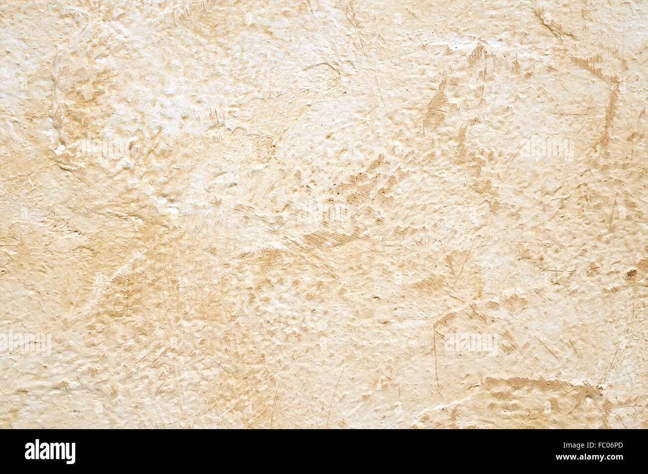 Wall with light brown plaster Stock Photo - Alamy