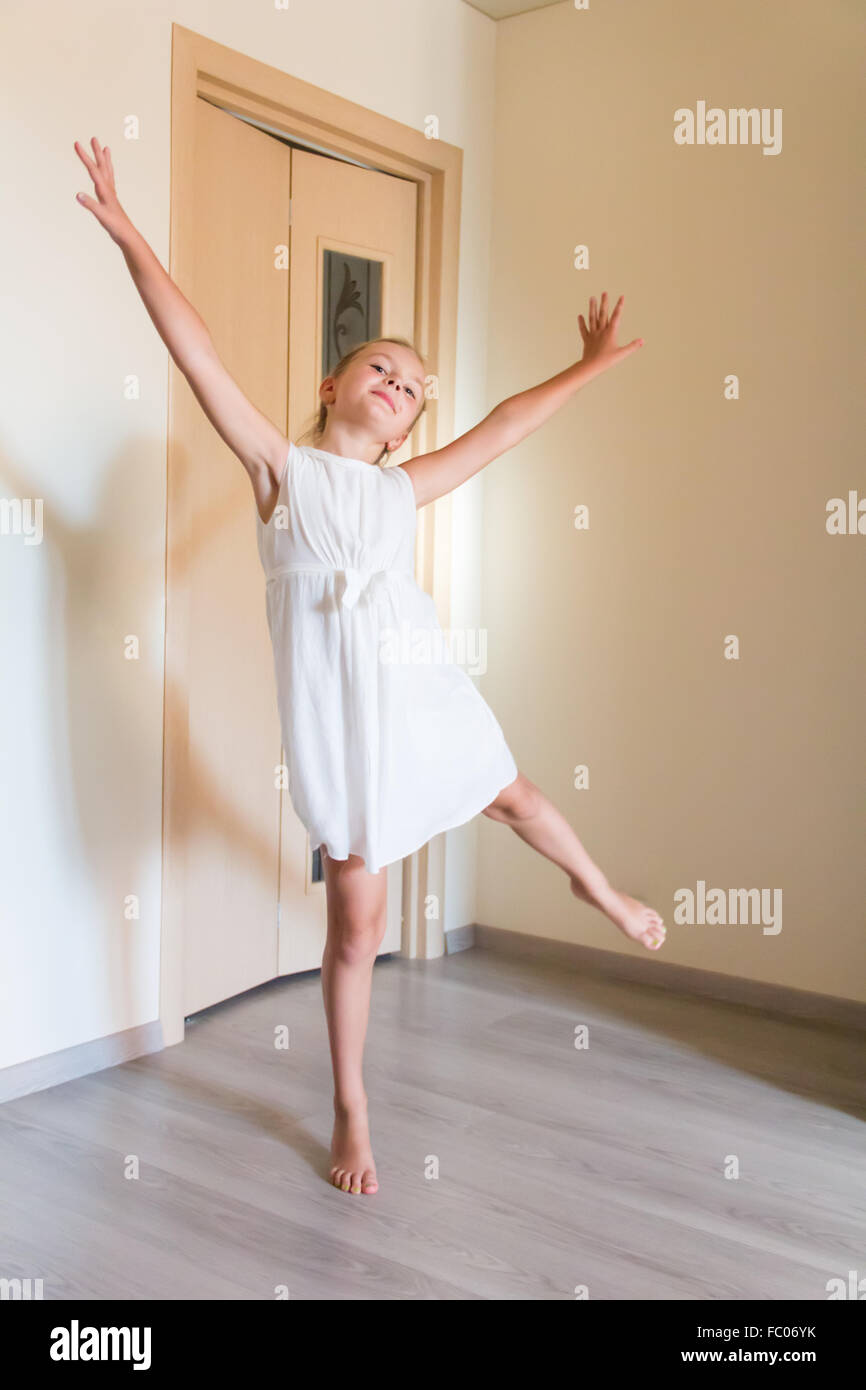 Cute jumping girl Stock Photo - Alamy