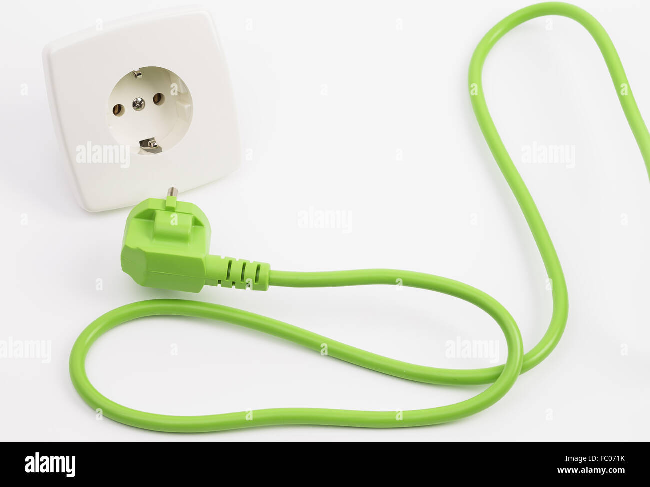 Green power plug and outlet Stock Photo - Alamy