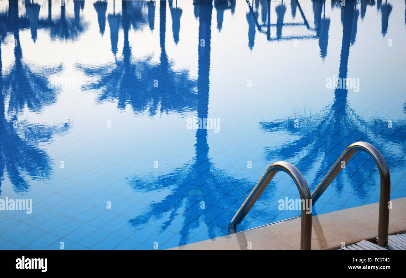 Swimming pool in touristic resort during summer time Stock Photo - Alamy