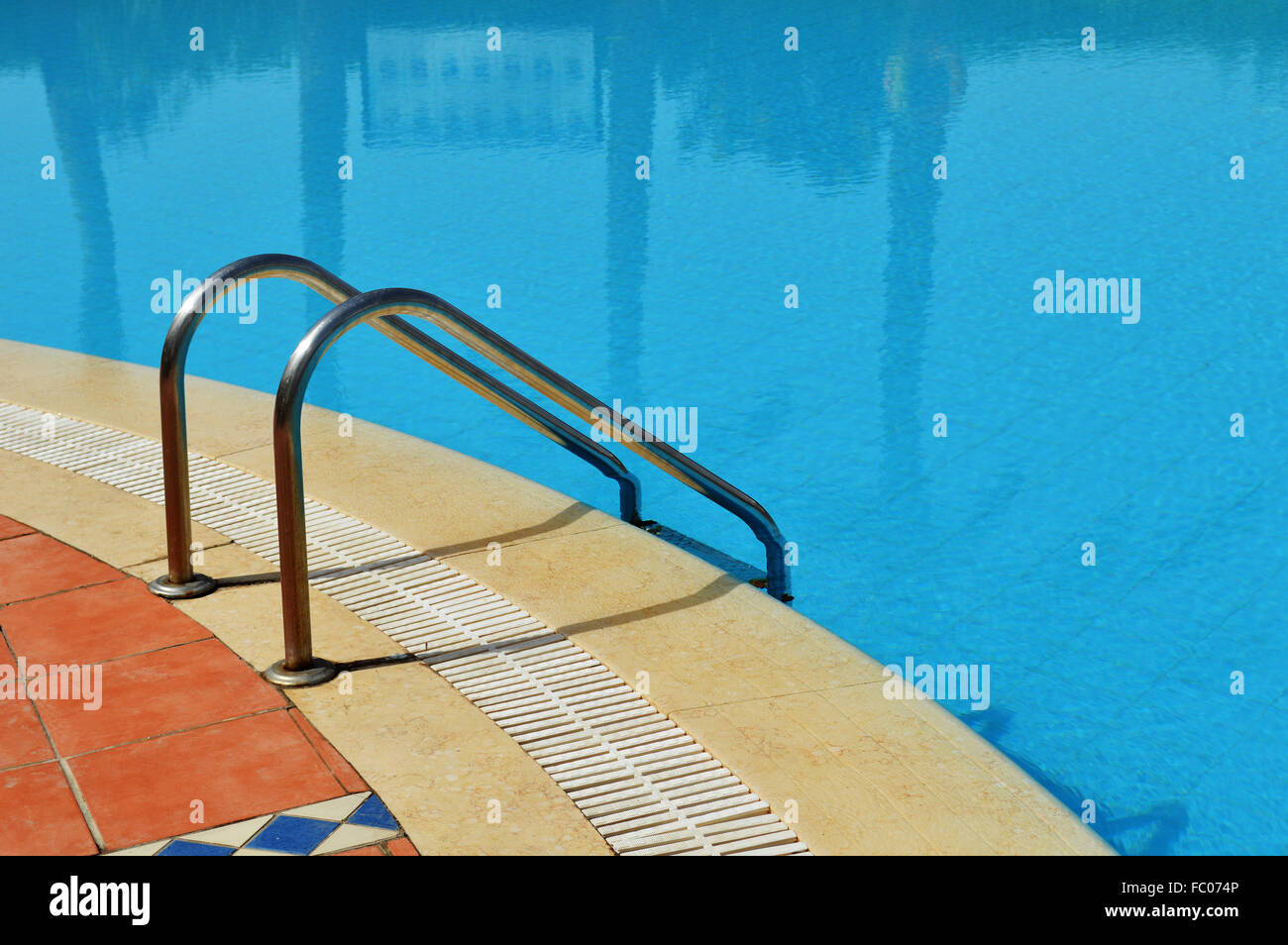Swimming pool in touristic resort during summer time Stock Photo - Alamy