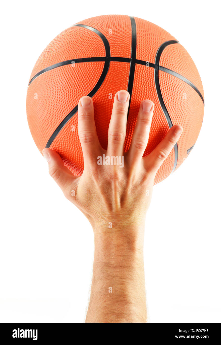 Hand and basketball isolated on white background Stock Photo - Alamy