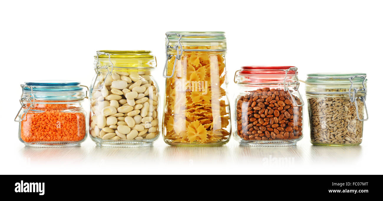 Jars with grain foods isolated on white background Stock Photo - Alamy