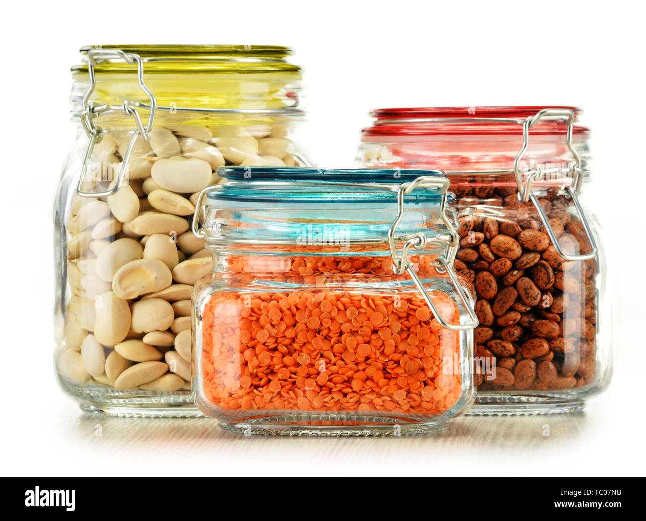 Jars with grain foods isolated on white background Stock Photo - Alamy