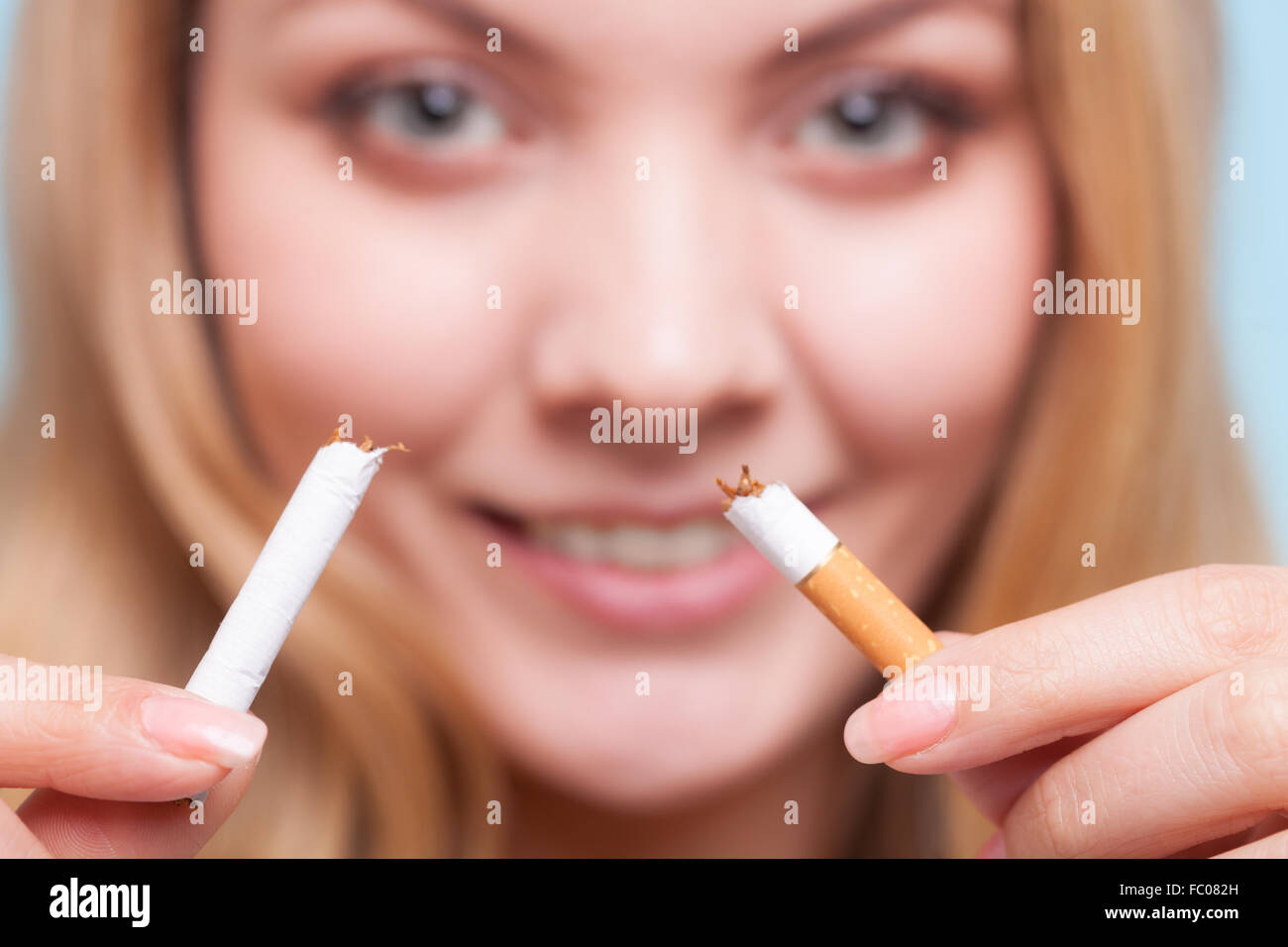 Woman smoke no filter cigarette hi-res stock photography and images - Alamy