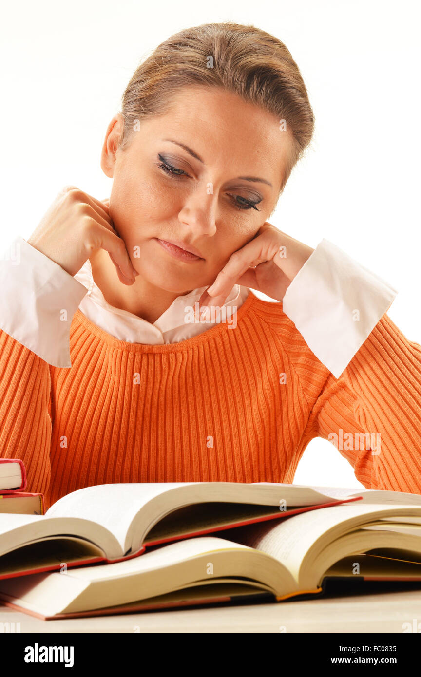 Young woman reading a book. Female student learning Stock Photo - Alamy