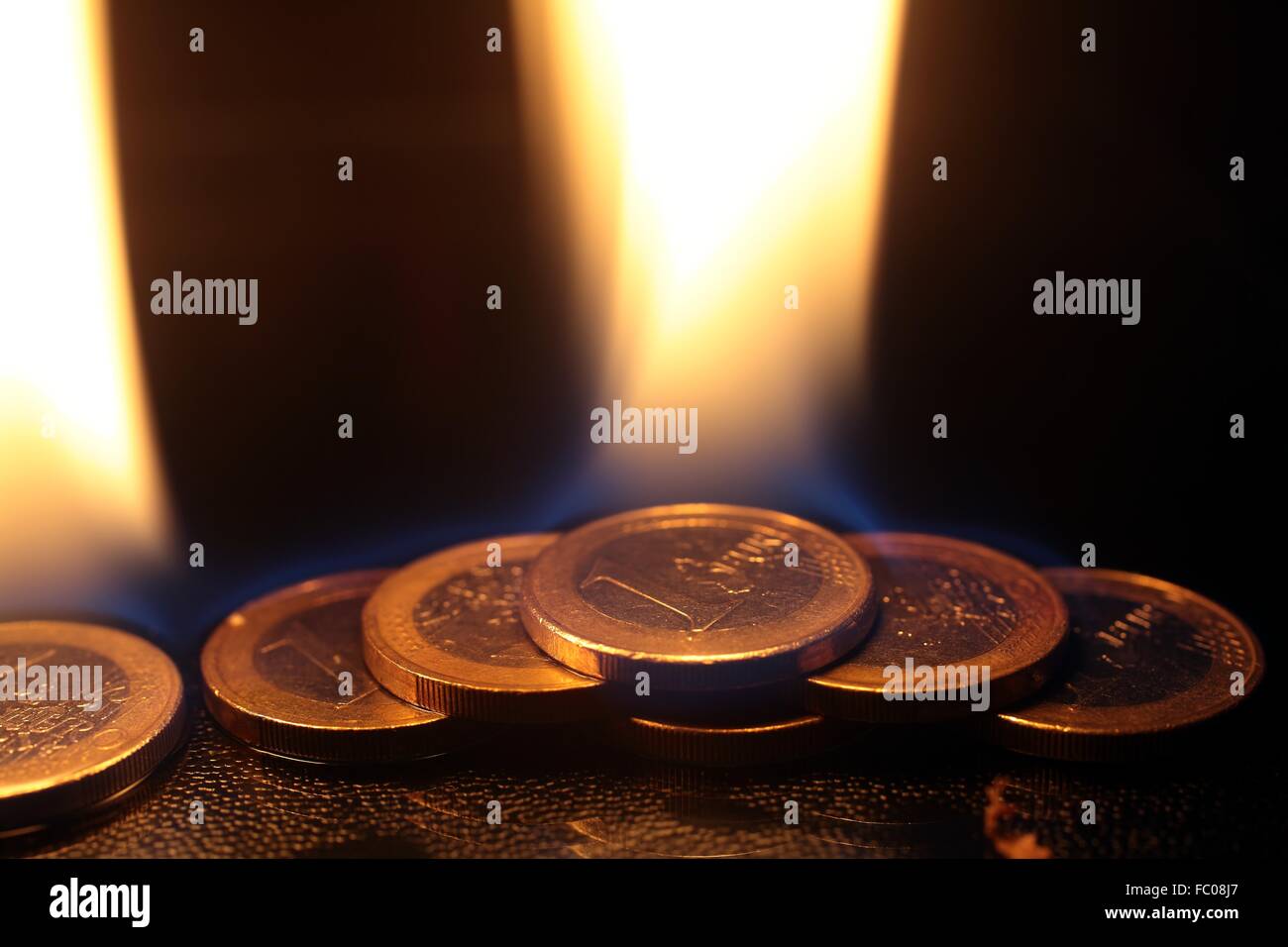 Euro coin burning hi-res stock photography and images - Alamy