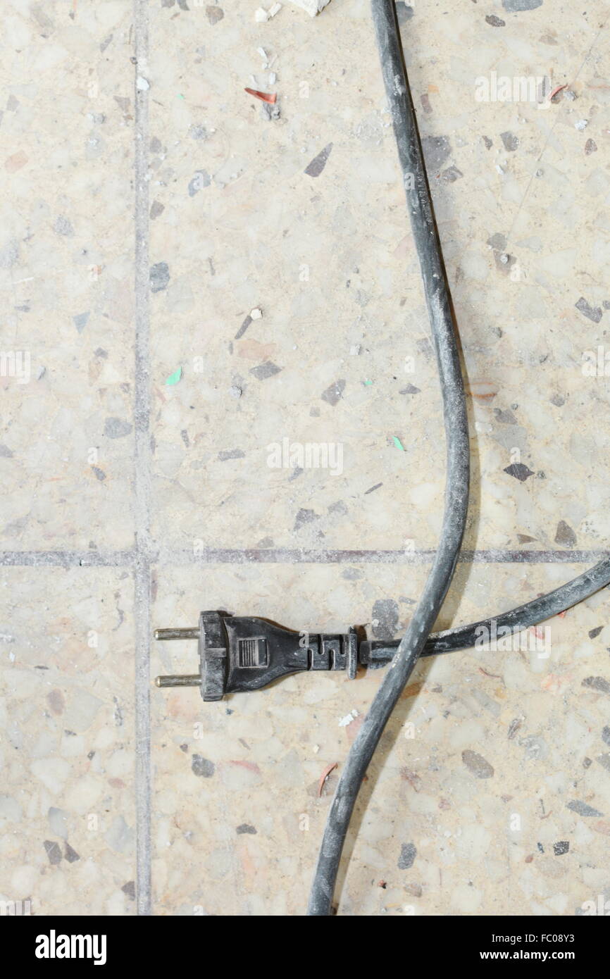 Black electric dirty old cable Stock Photo - Alamy