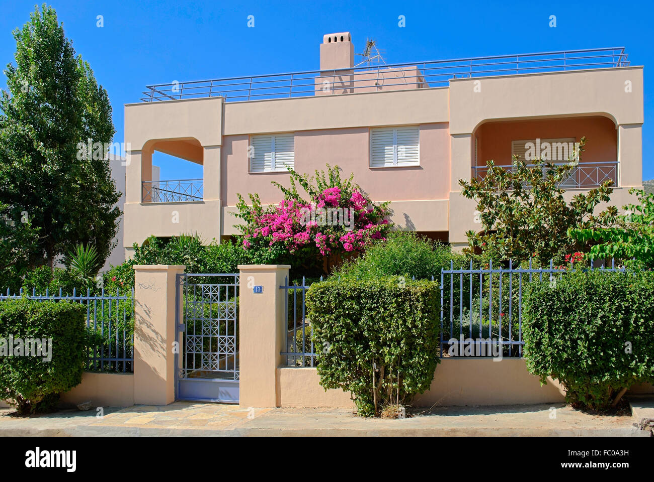 House with trees Stock Photo - Alamy