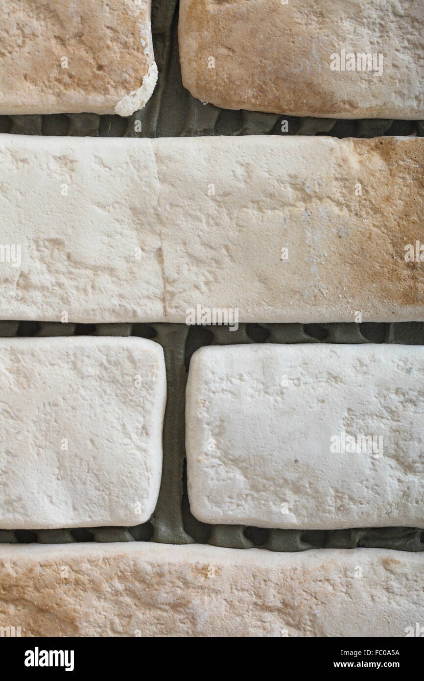 Renovation at home wall clinker tile as background Stock Photo - Alamy