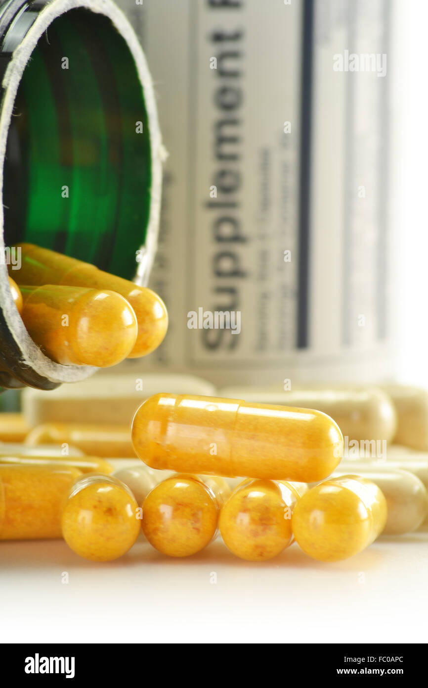 Composition with dietary supplement capsules and containers. Variety of ...