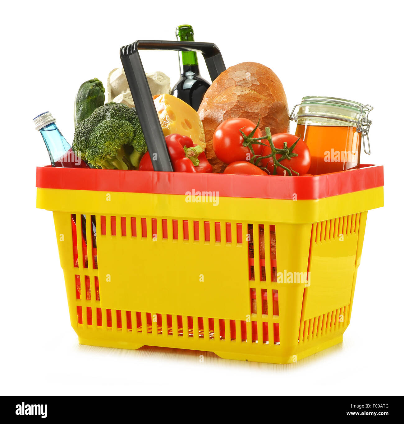Shopping basket and groceries isolated on white Stock Photo - Alamy