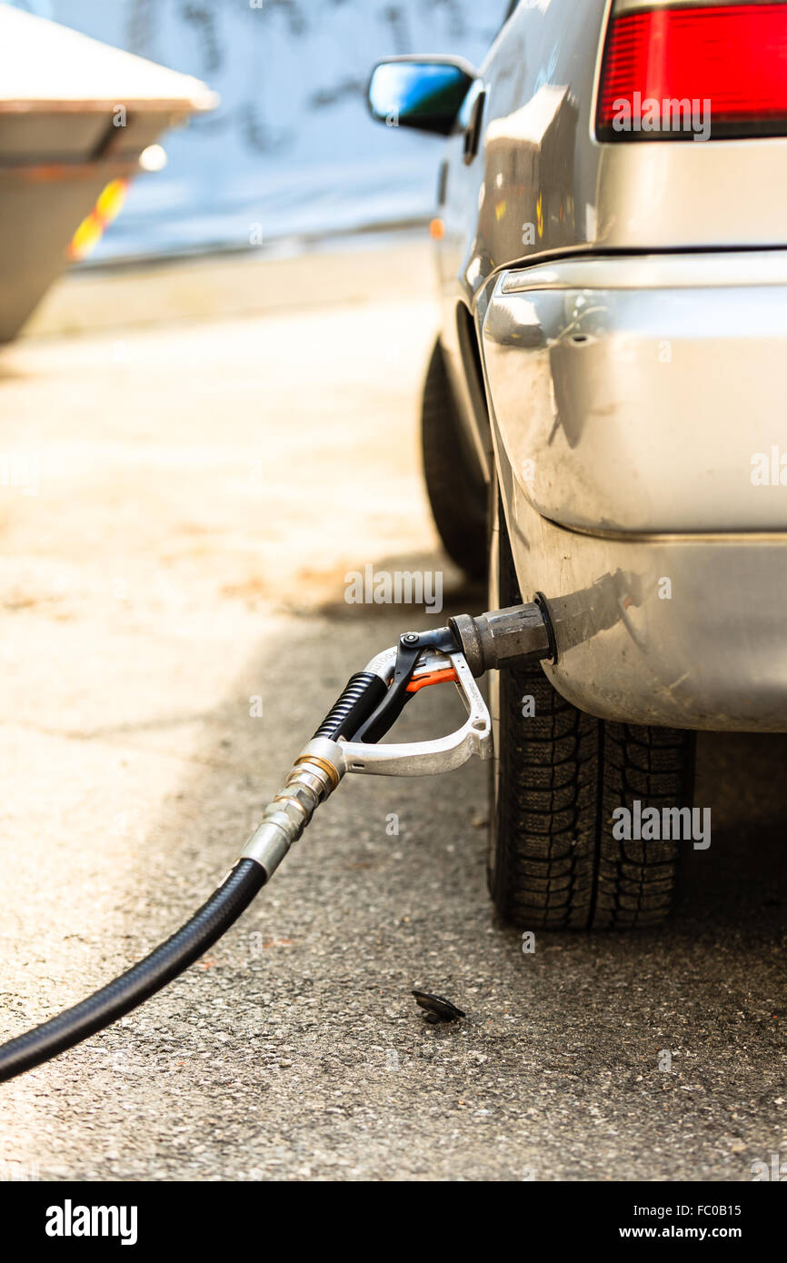 Car gas station being filled hi-res stock photography and images - Alamy