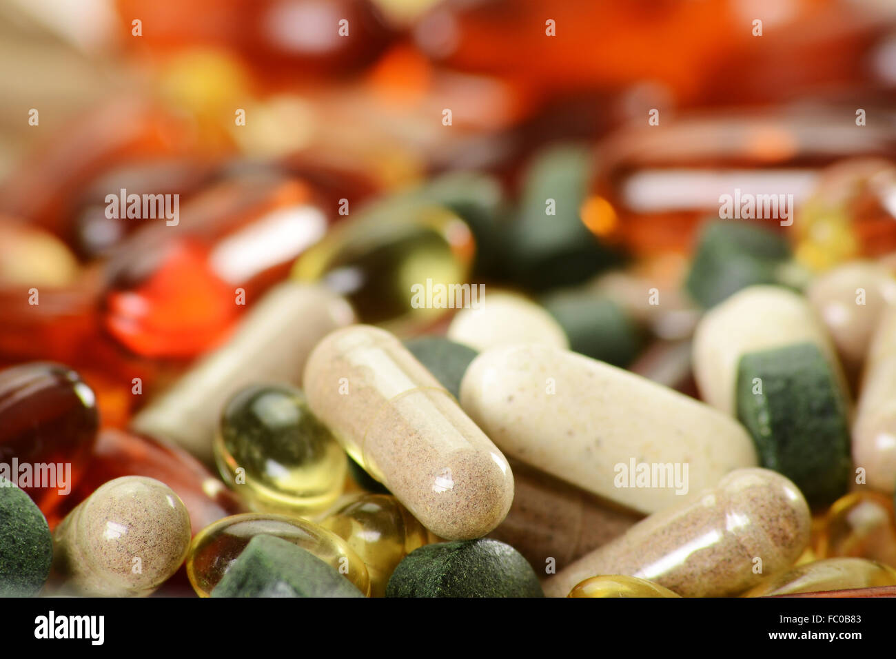 Composition with dietary supplement capsules and tablets Stock Photo ...