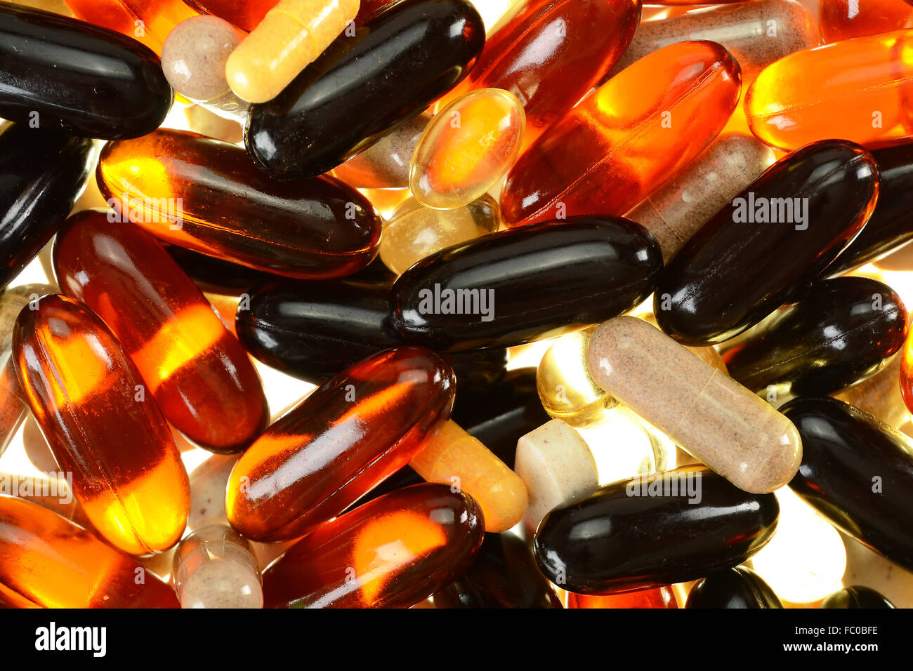Composition with dietary supplement capsules and tablets Stock Photo ...