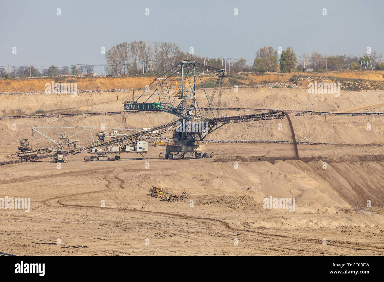 Opencast brown coal mine. Giant excavator Stock Photo - Alamy
