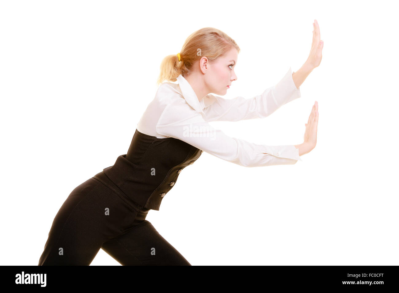 Businesswoman pushing away blank copy space Stock Photo - Alamy