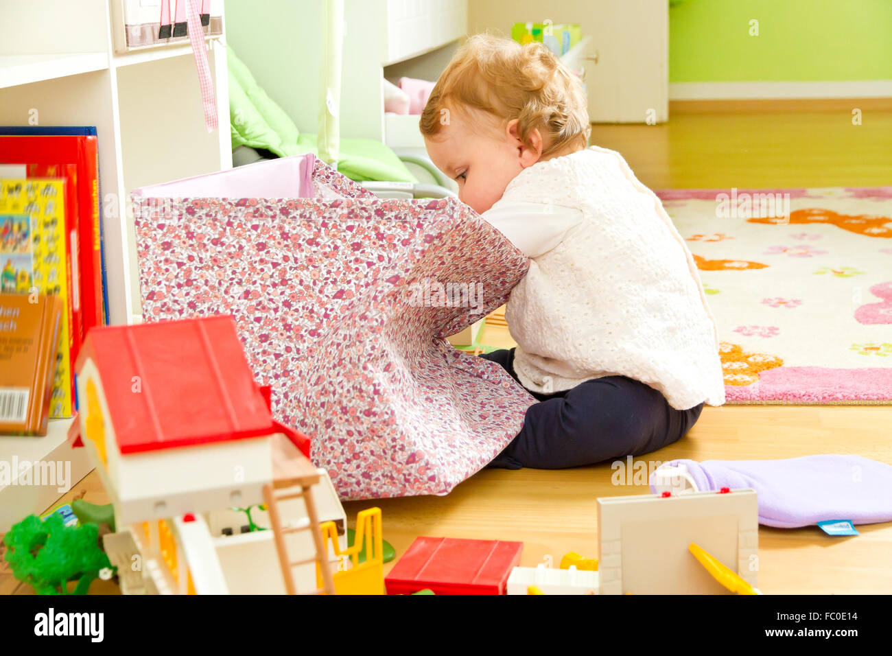 Baby curious hi-res stock photography and images - Alamy