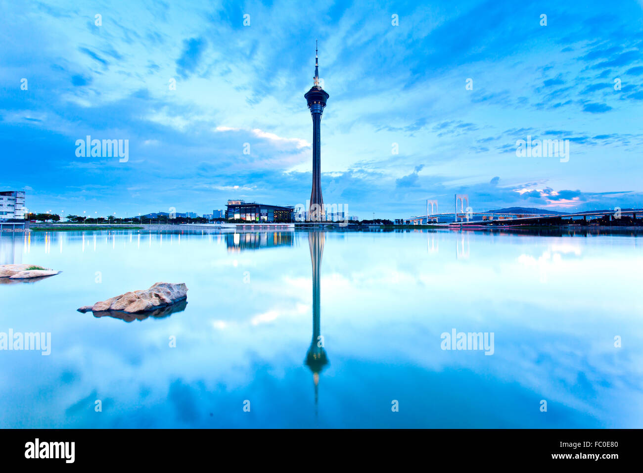 Macau sunset along pond Stock Photo - Alamy