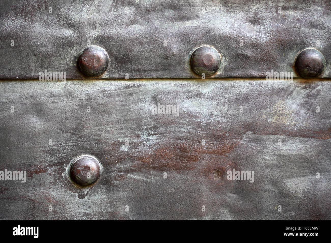Black metal plate or armour texture with rivets Stock Photo - Alamy