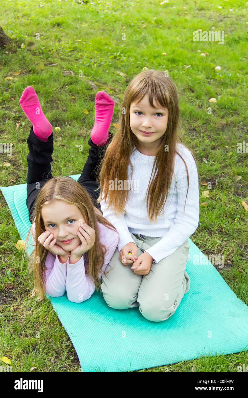 Cute two playing girls Stock Photo - Alamy
