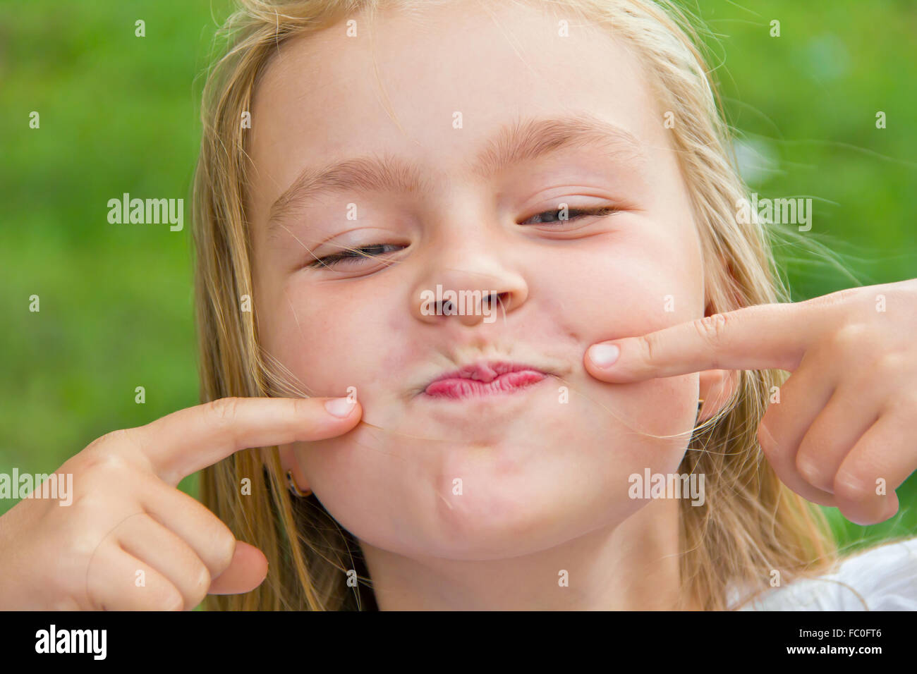 Cute smiling girl Stock Photo - Alamy