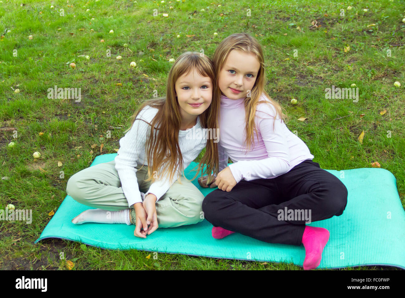 Cute two playing girls Stock Photo - Alamy