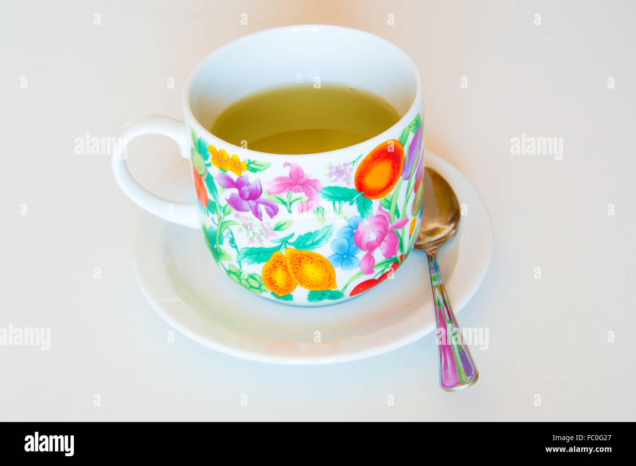 Mallow herbal tea cup on orange background Stock Photo - Alamy