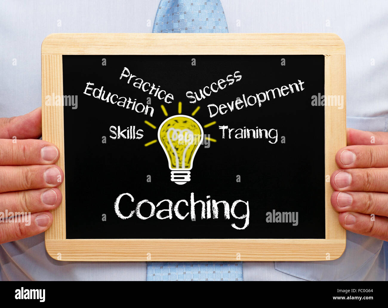 Coach with Coaching Chalkboard Stock Photo - Alamy